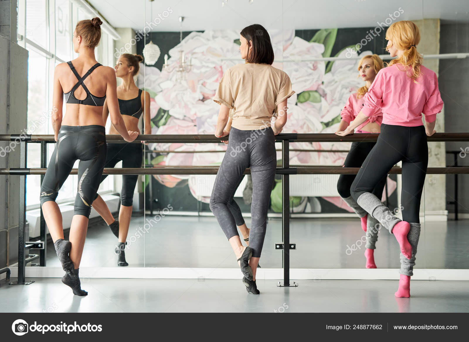 Back View Full Length Portrait Row Elegant Young Women Practicing Stock ...