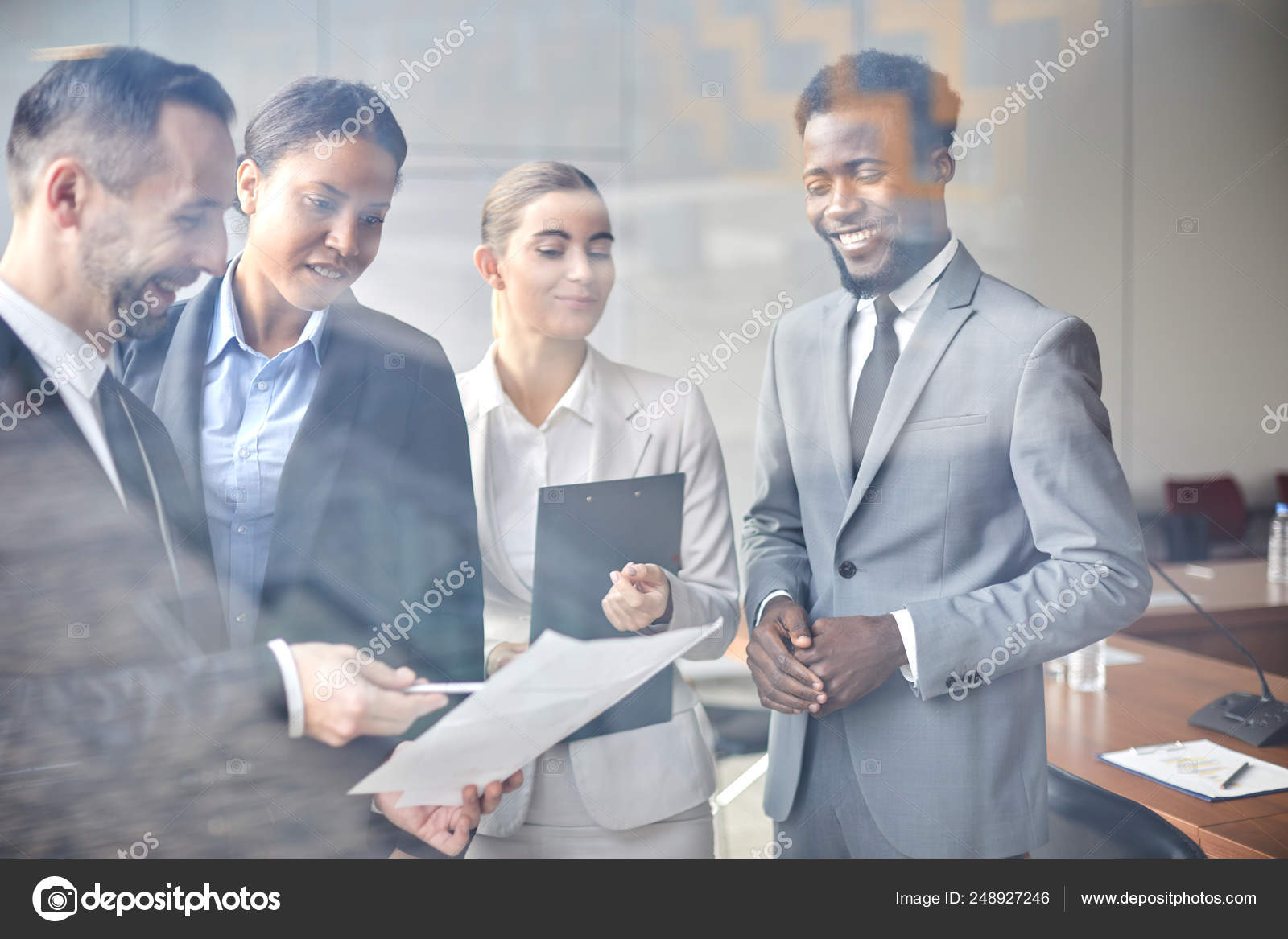 Group Intercultural Delegates Formalwear Looking Paper While Reading ...