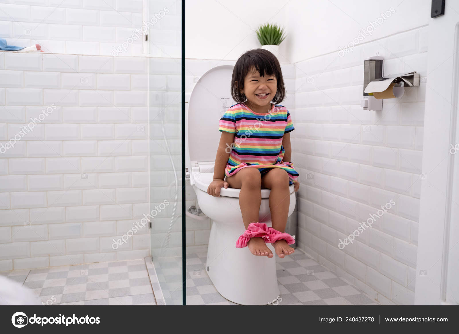 Child sitting and learning how to use the toilet Stock Photo by ©odua ...