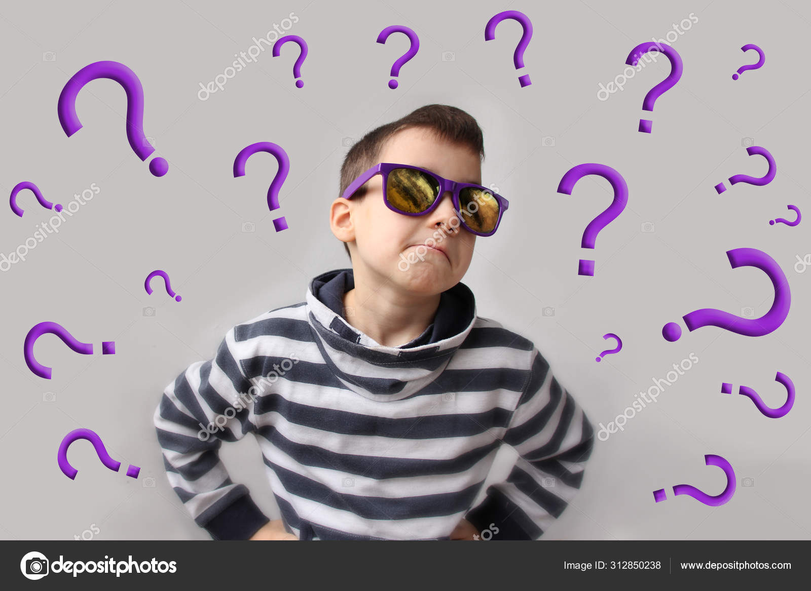 Boy in dark sunglasses with a mohawk on his head and a skeptical grin ...