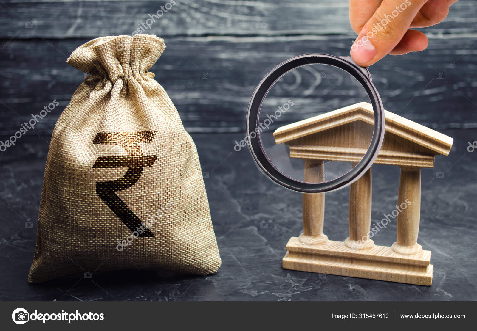 A bag with indian rupee (rupiah) and a government building. Money ...