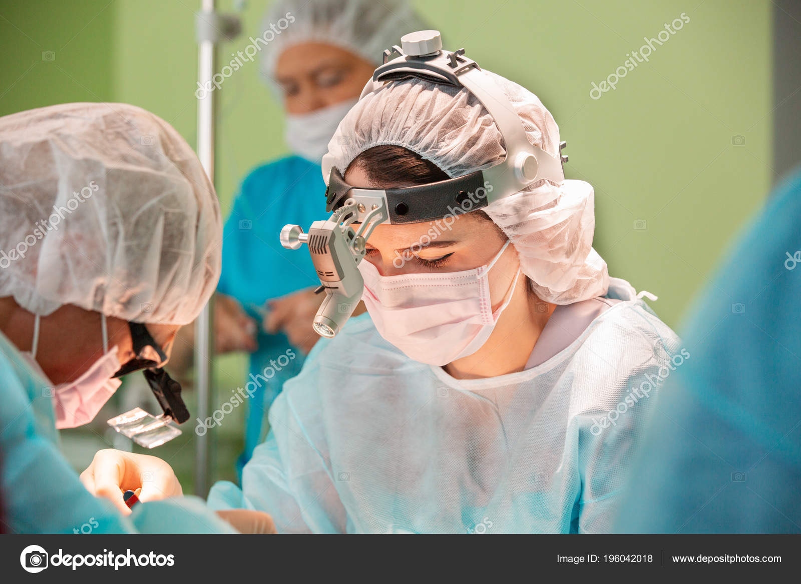 Female Surgeon At Work