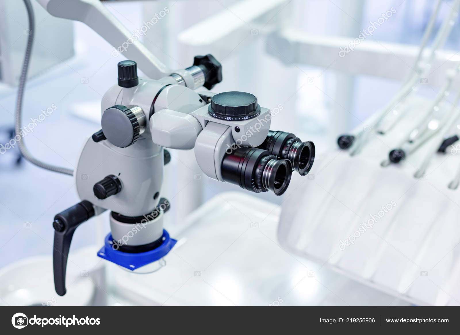 Dental microscope on the background of modern dentistry. Medical ...