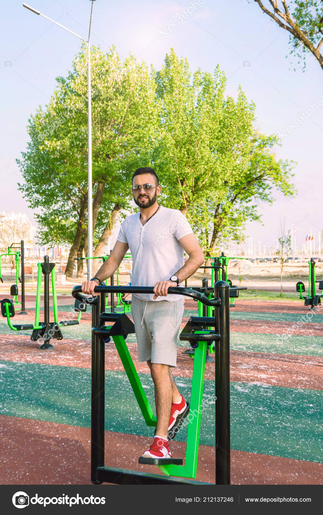 Young Guy Good Physical Shape Beard Sunglasses Trains Simulators Street ...