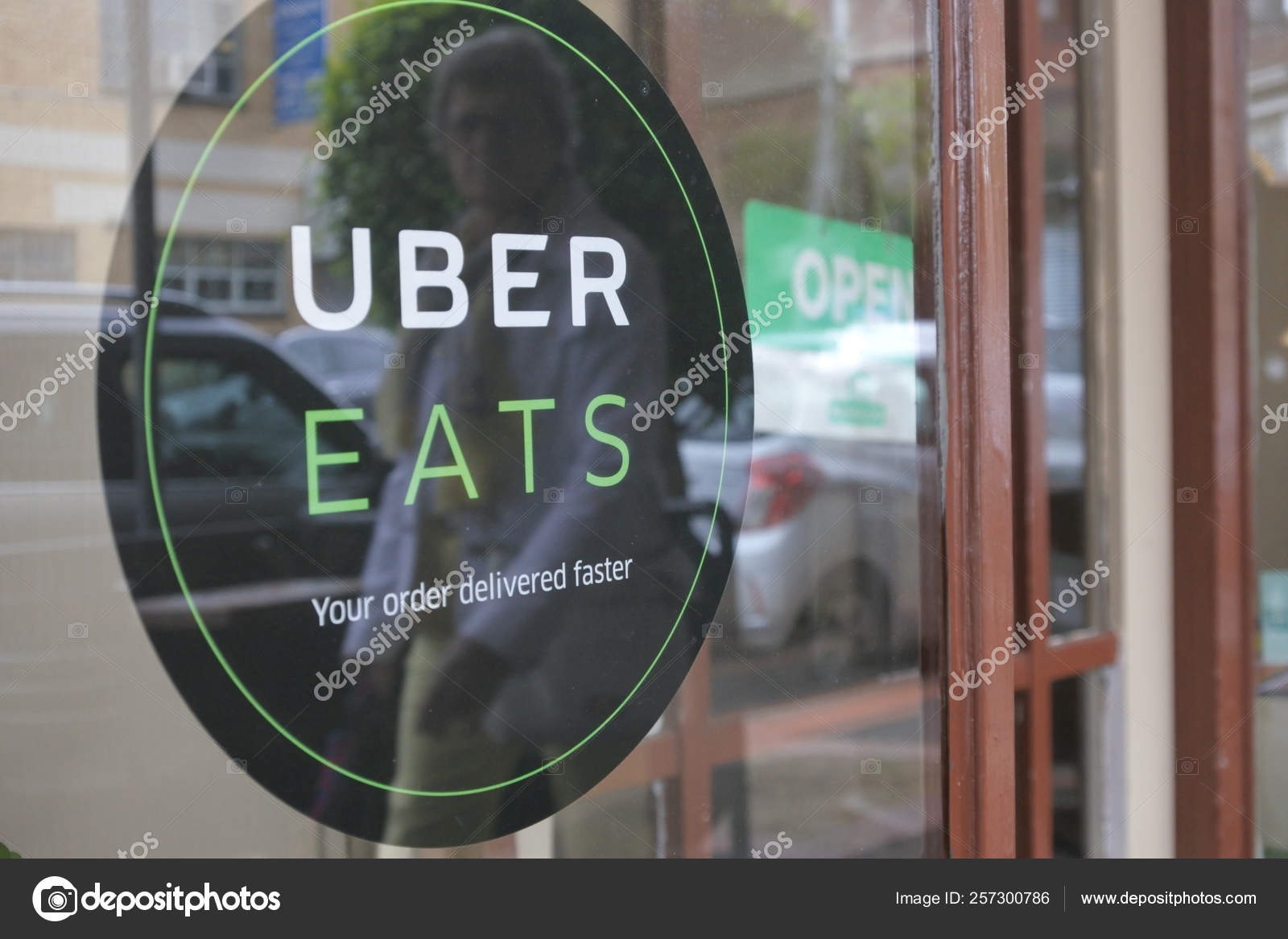 Uber Eats Sign on a restaurant door – Stock Editorial Photo ...