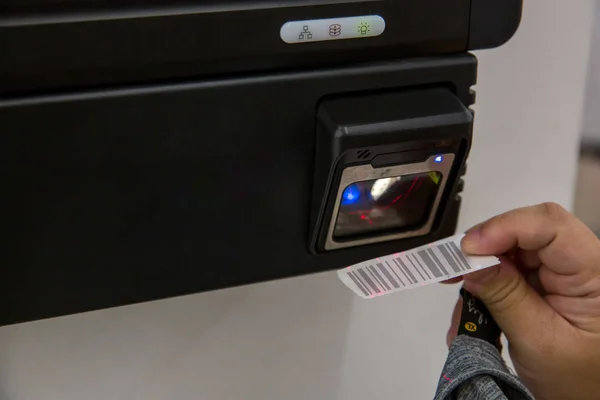 checking the price of the products on the scanner at the grocery store ...