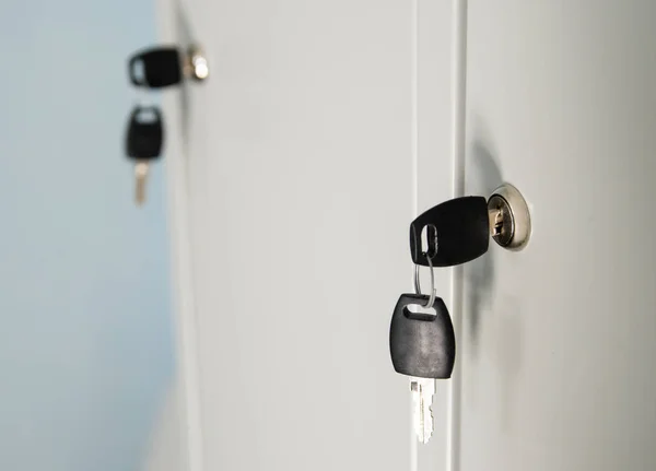 keys in the door of a private locker - Stock Image - Everypixel