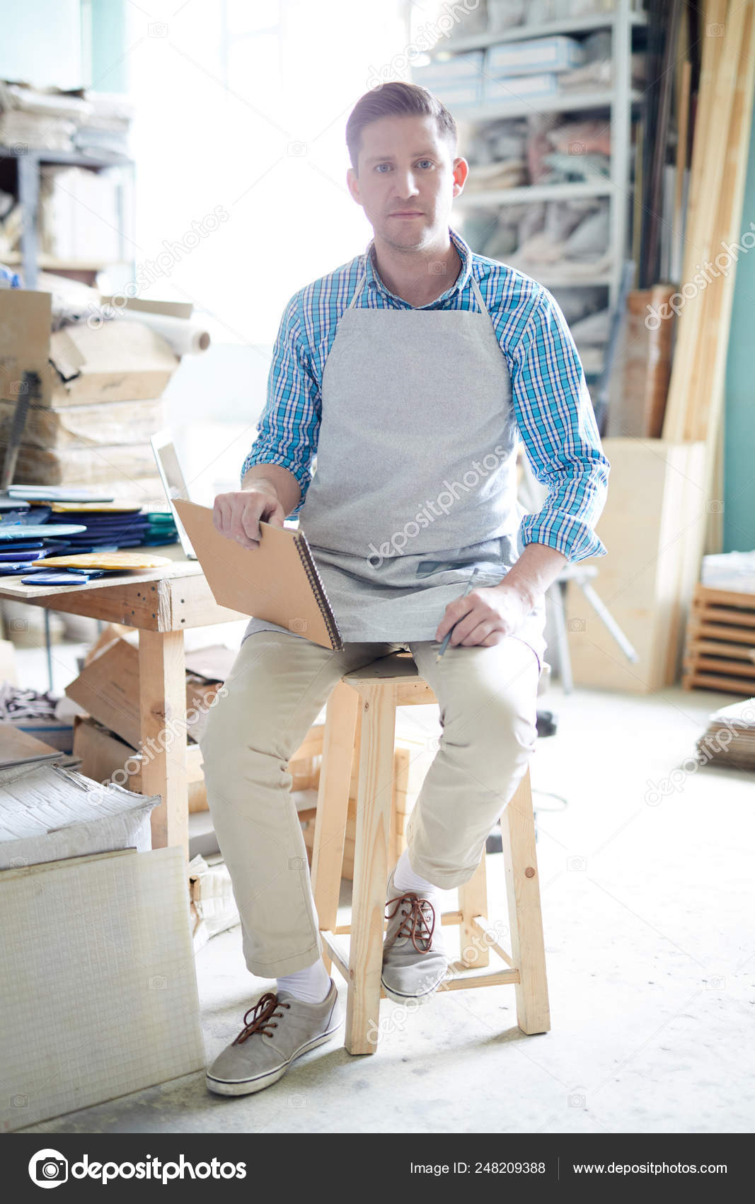 Young Creative Man Workwear Sitting Chair His Workshop Table Patterns ...