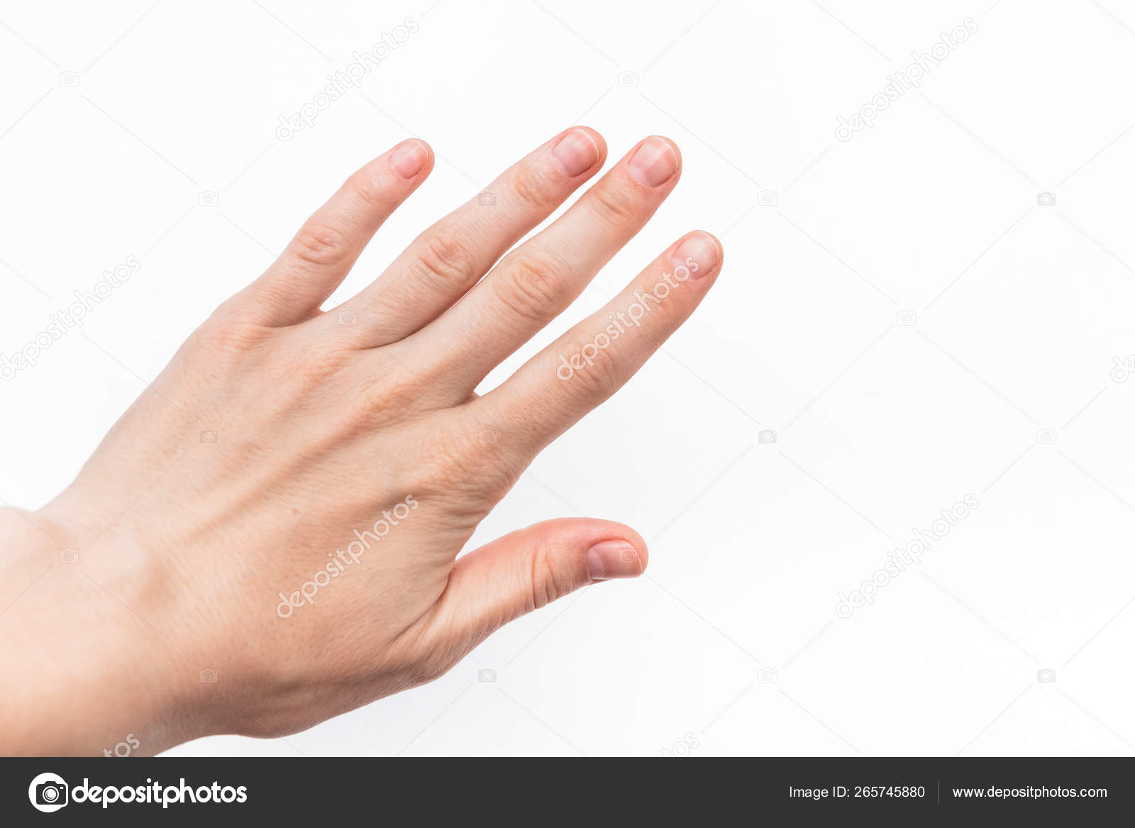 Female hand with short nails and neat manicure without varnish on a ...