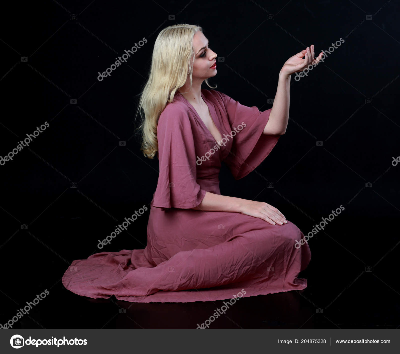 Full Length Portrait Blonde Girl Wearing Long Purple Dress Seated Stock