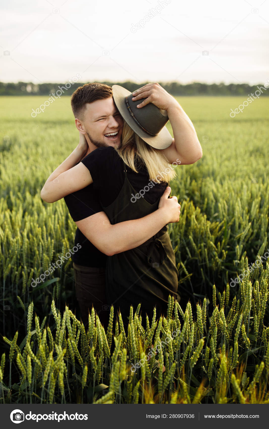 Beautiful Young Couple Hugging Wheat Field — Stock Photo © SHUNEVICH ...