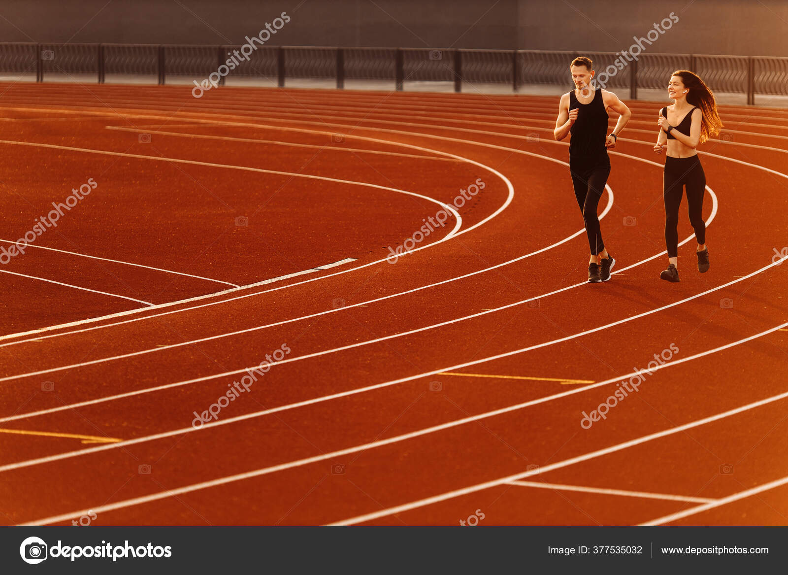 Two Young Athletes Running Stadium — Free Stock Photo © SHUNEVICH ...