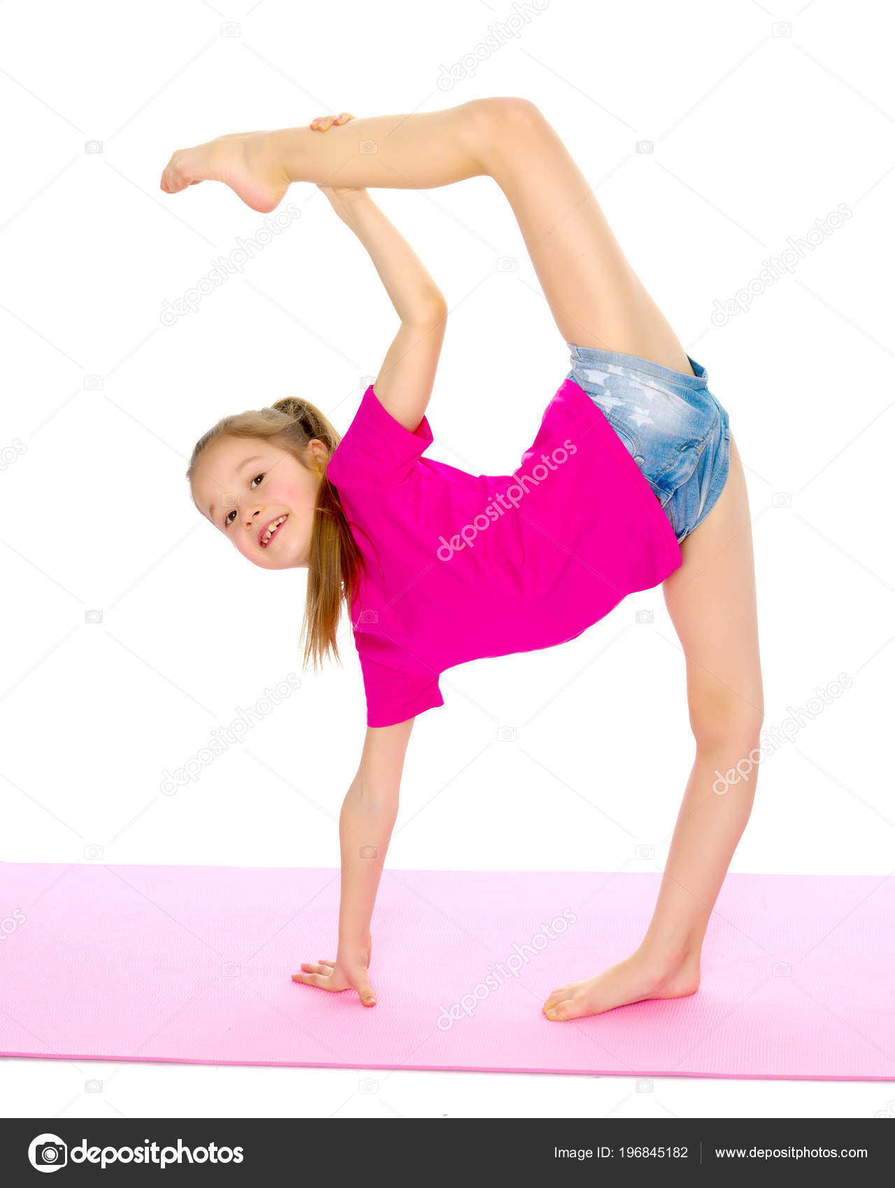The gymnast perform an acrobatic element on the floor. Stock Photo by ...