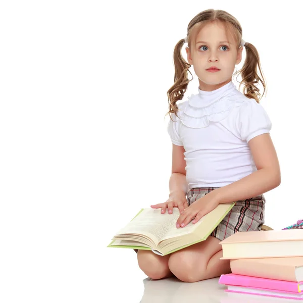 Child with stack book. — Stock Photo © poznyakov #12797976