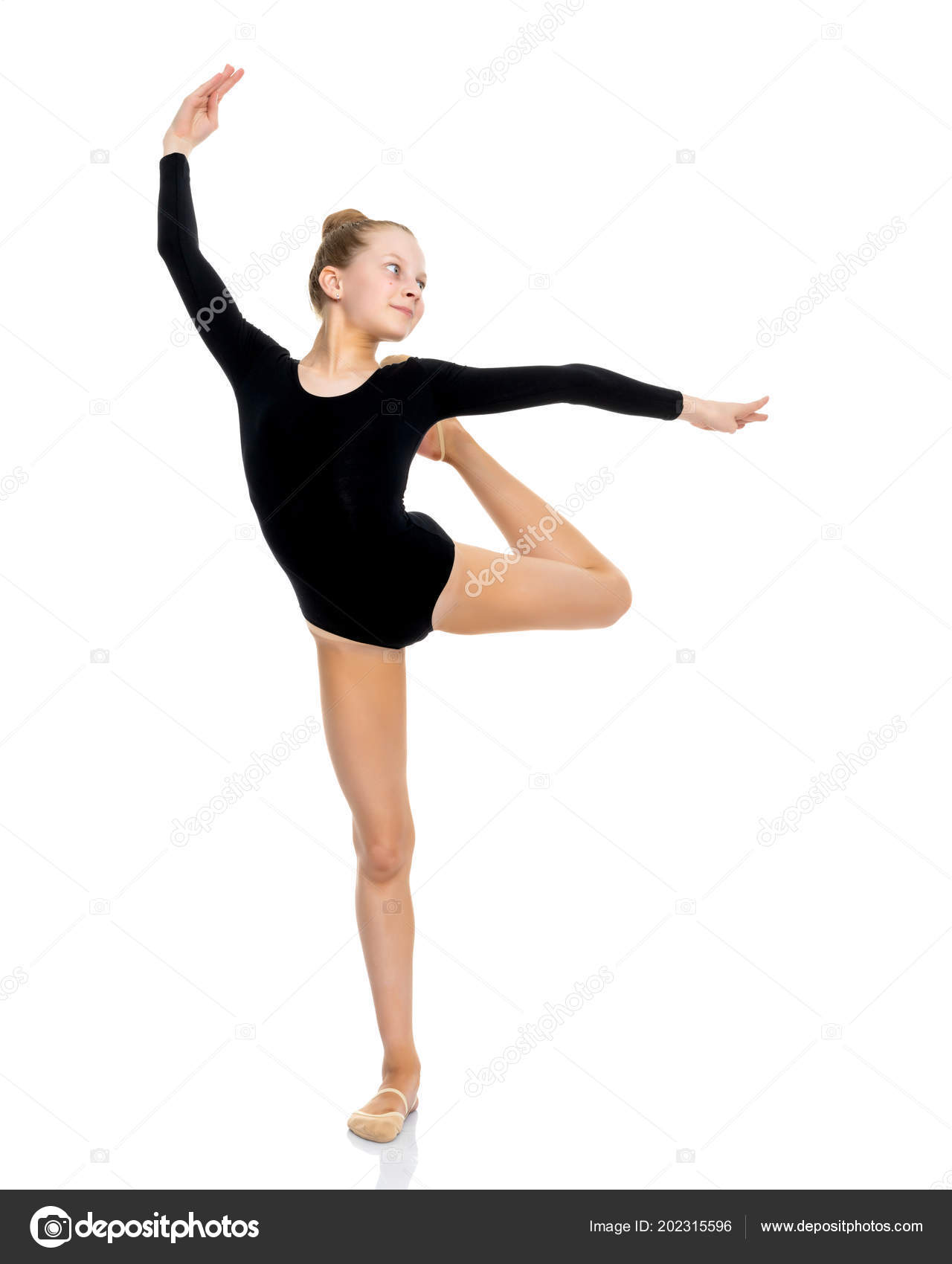 The gymnast balances on one leg. — Stock Photo © lotosfoto1 #202315596