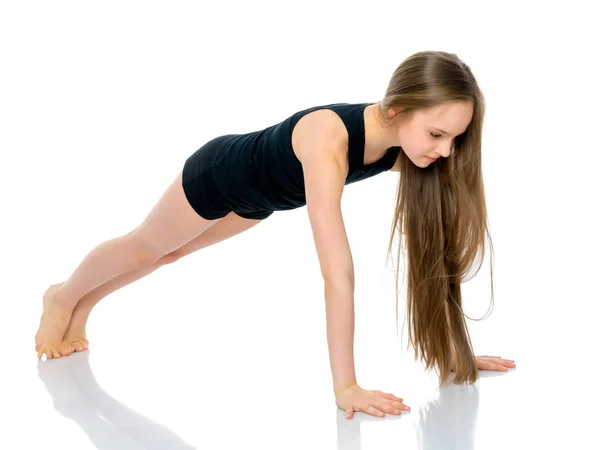The gymnast perform an acrobatic element on the floor. — Stock Photo ...
