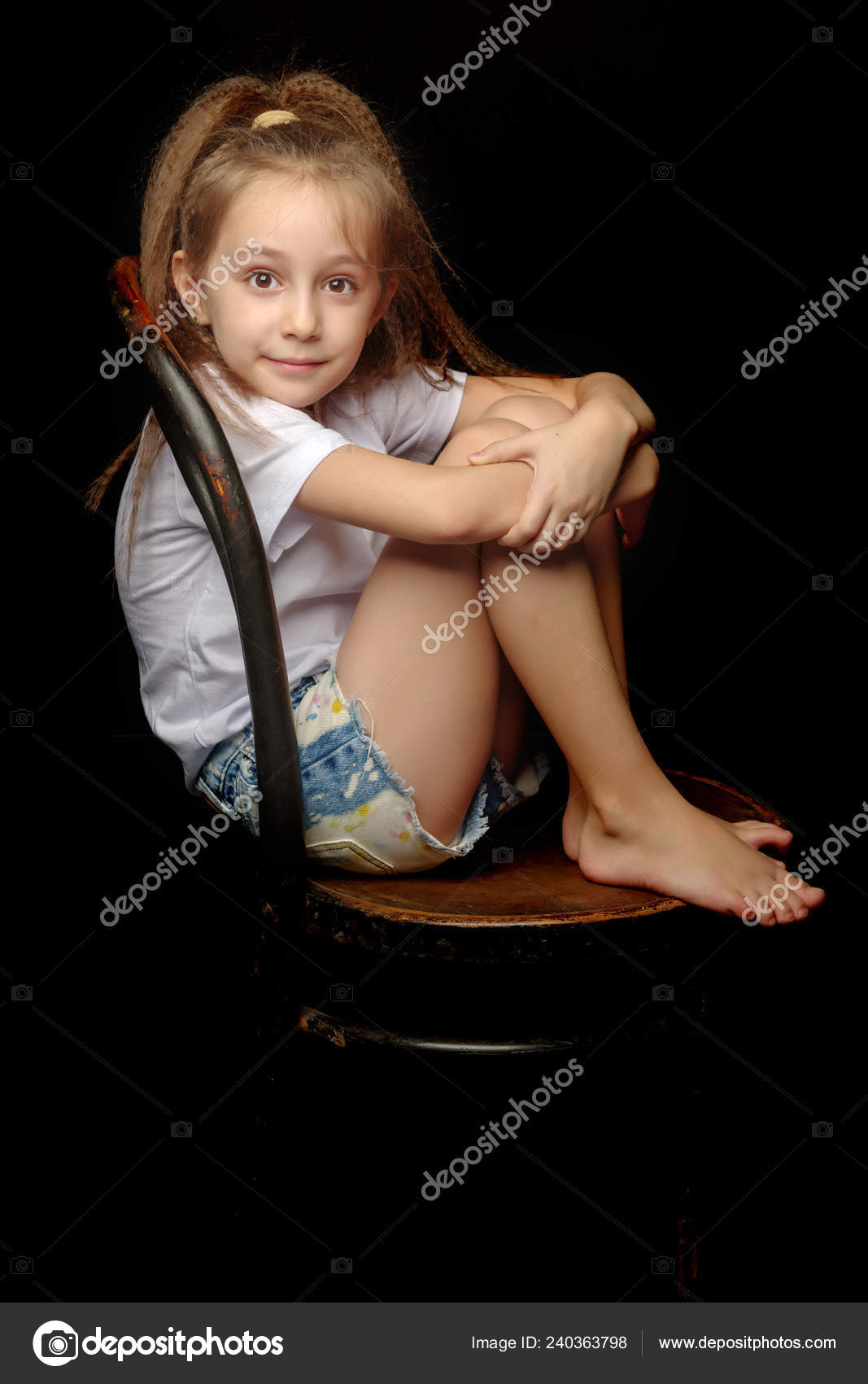 Little girl on a black background Stock Photo by ©lotosfoto1 240363798 Little girl on a black background Stock Photo by ©lotosfoto1 240363798