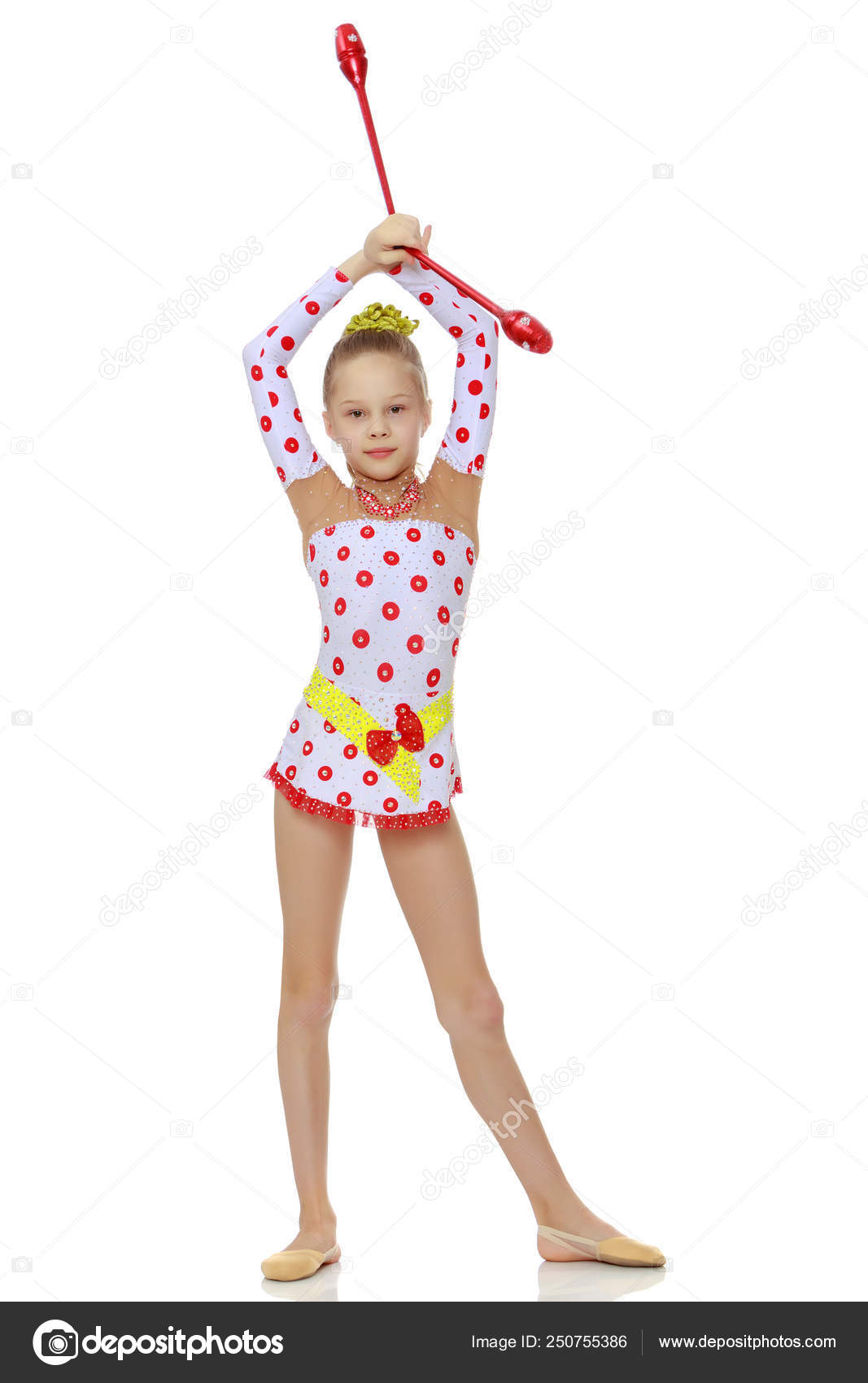 A girl gymnast performs exercises with a mace. Stock Photo by ...