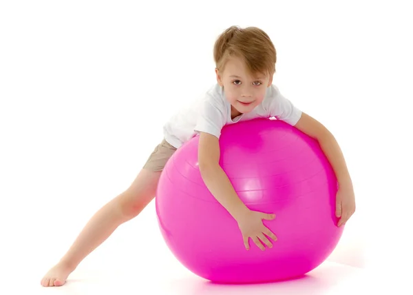 Child exercise ball Stock Photos, Royalty Free Child exercise ball ...