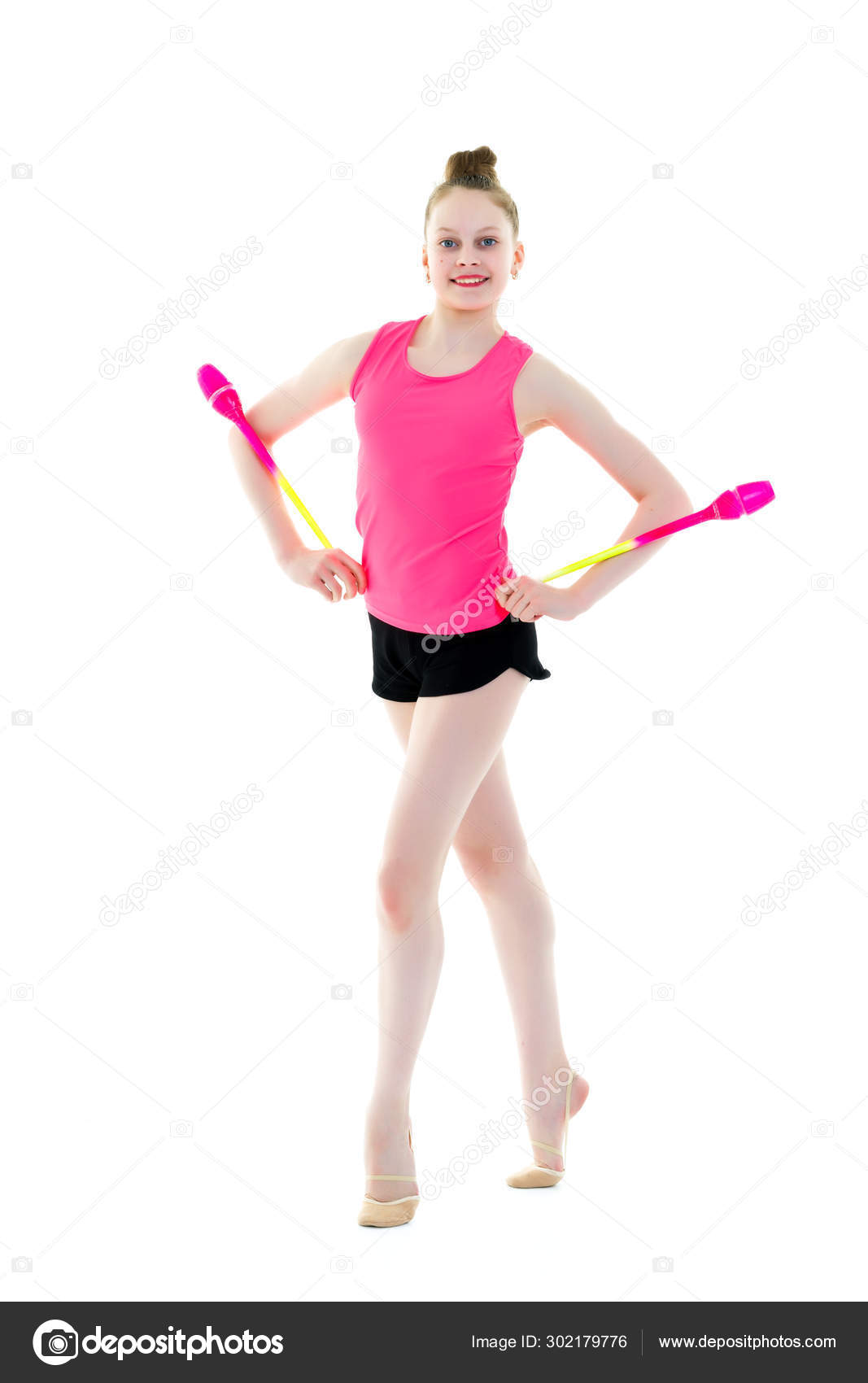 A girl gymnast performs exercises with a mace. — Stock Photo ...