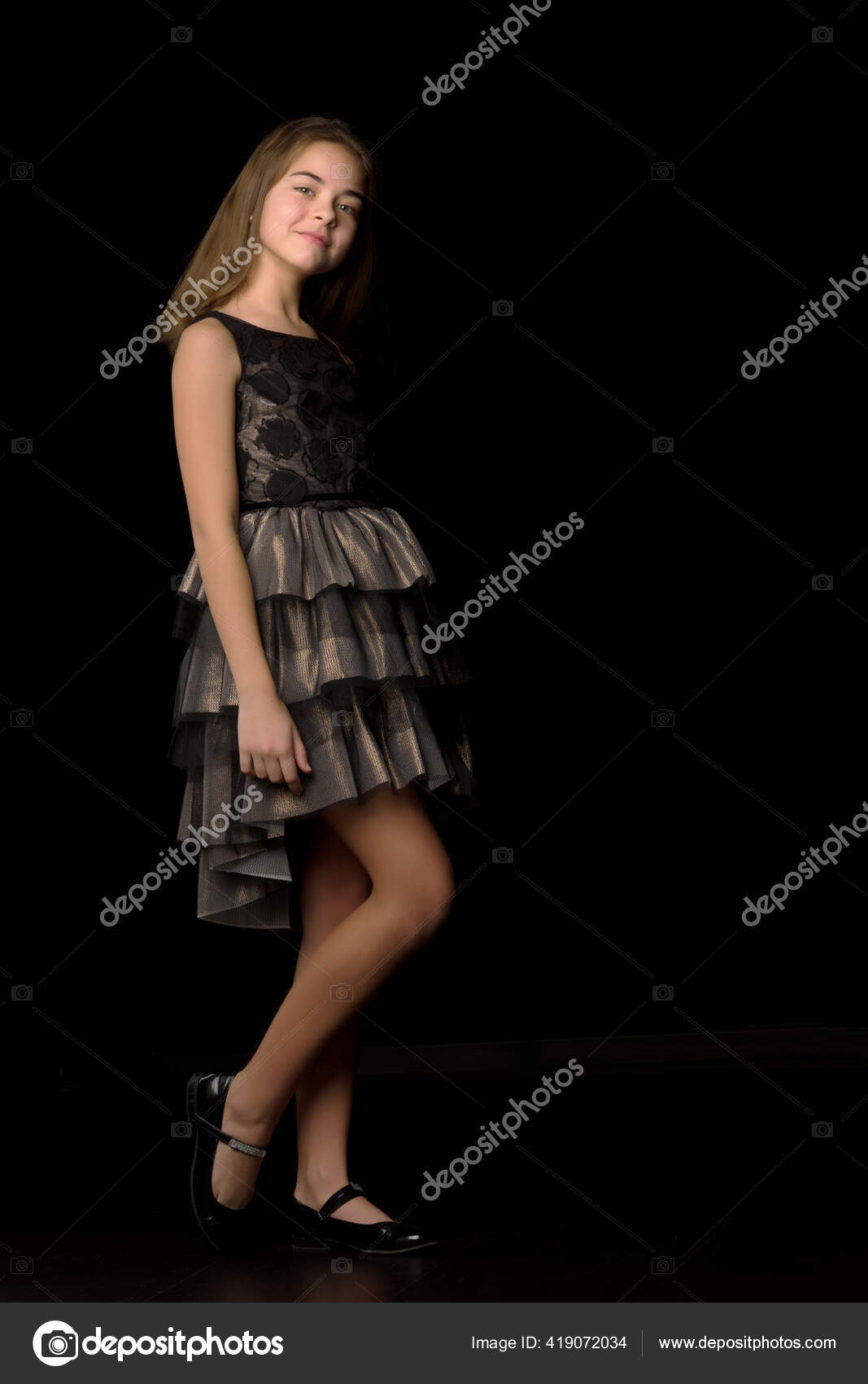 Beautiful young teen girl studio photo on black background Stock Photo by ©lotosfoto1 419072034