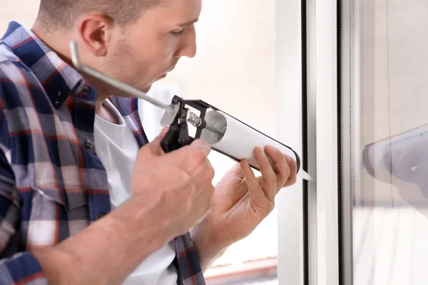 Construction Worker Adjusting Installed Window Screwdriver Indoors ...