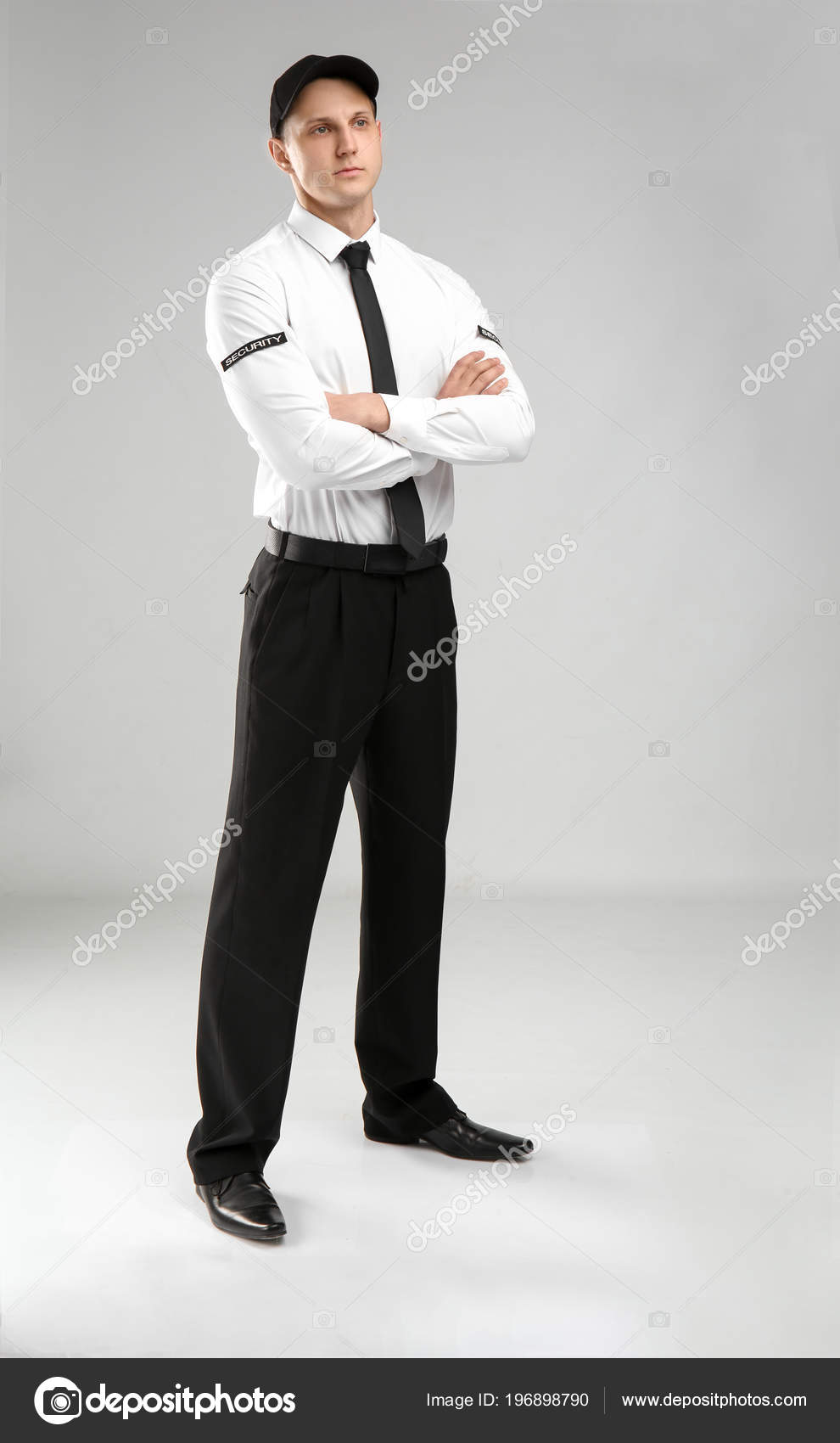 Male Security Guard Uniform Color Background Stock Photo by ©NewAfrica ...
