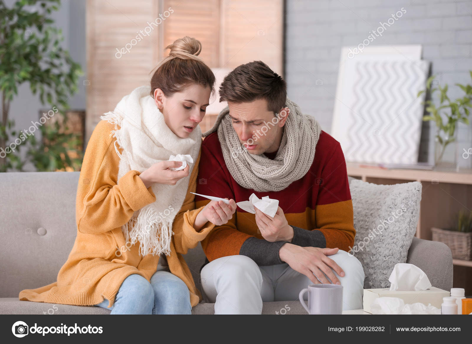 Couple Suffering Cold Together Sofa Home Stock Photo by ©NewAfrica ...