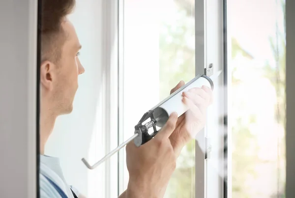 Construction Worker Adjusting Installed Window Screwdriver Indoors ...