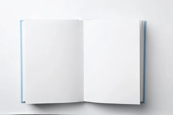 Open Book White Background Top View — Stock Photo © NewAfrica #652370916