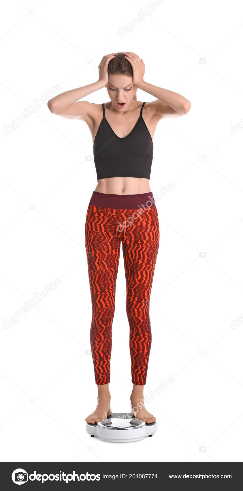 Sad Young Woman Measuring Her Weight Using Scales White Background ...