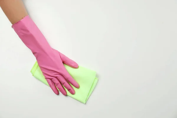 Woman holding rag on white background. Cleaning service - Stock Image ...