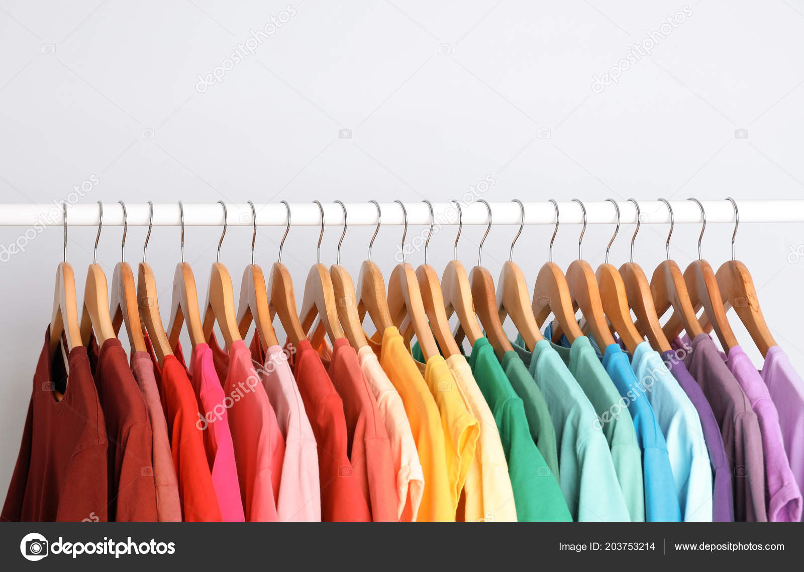 Rack Rainbow Clothes Light Background Stock Photo by ©NewAfrica 203753214