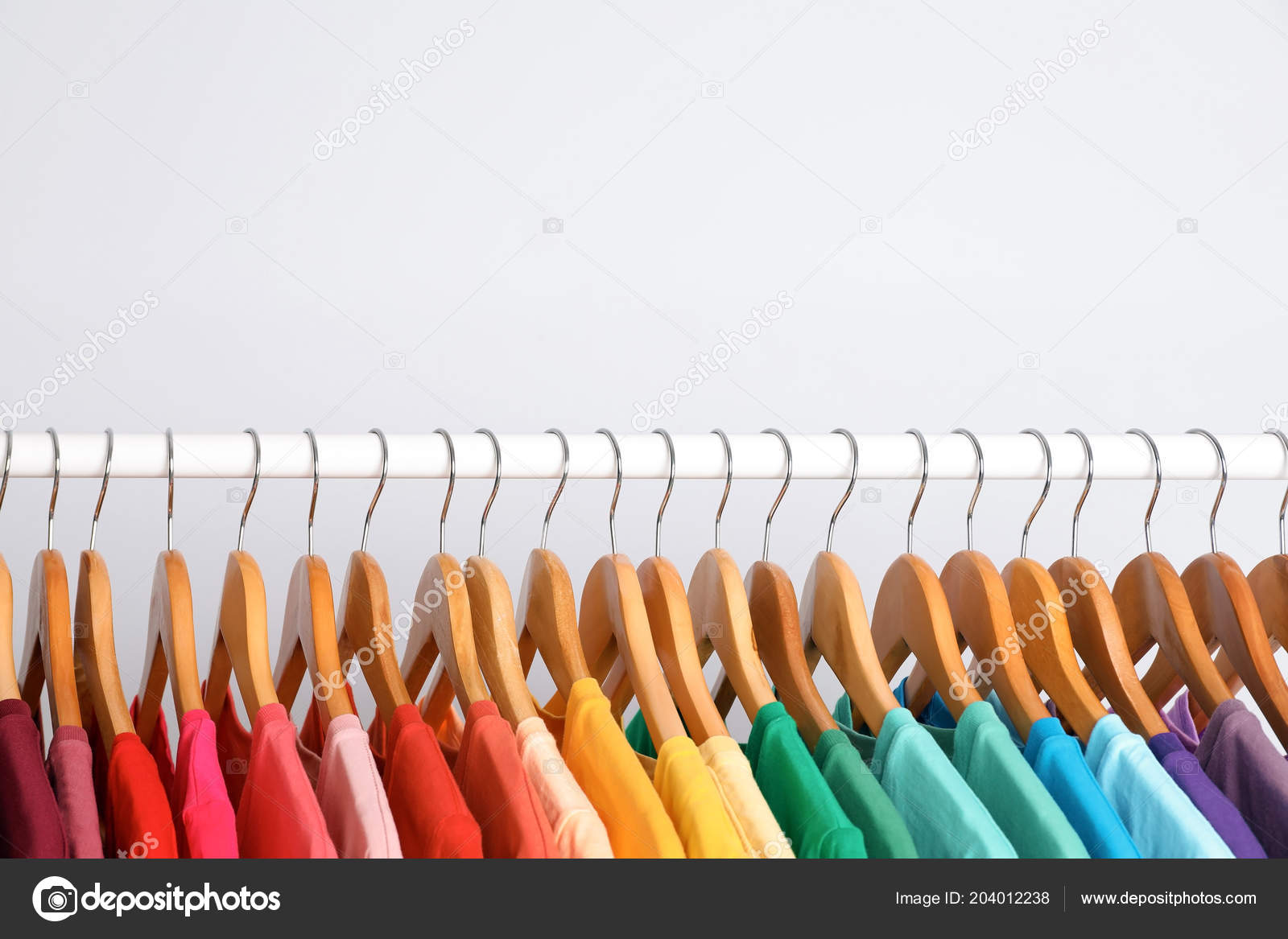 Rack Rainbow Clothes Light Background Stock Photo by ©NewAfrica 204012238