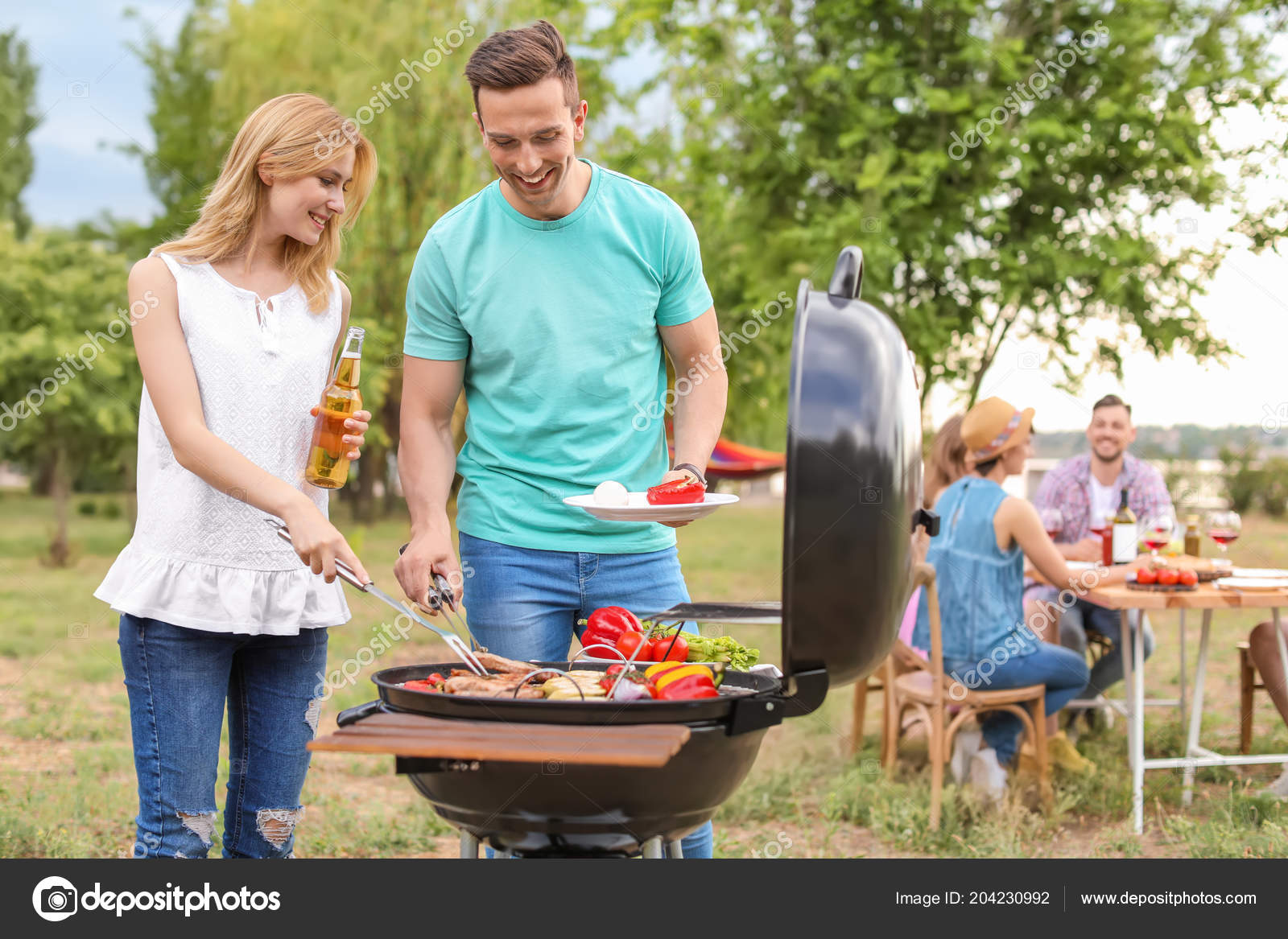 Young People Having Barbecue Modern Grill Outdoors Stock Photo by ...