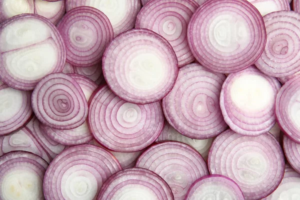 Red onion background — Stock Photo © sumners #111319300