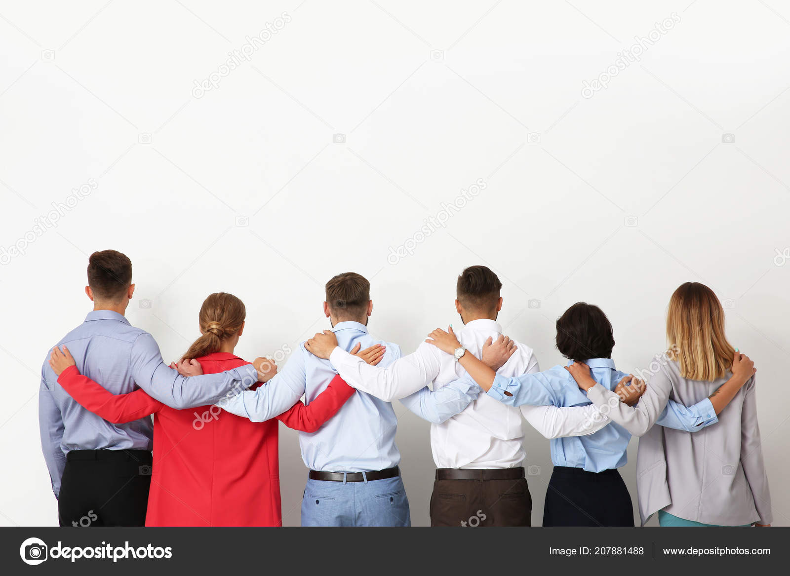 Group Young People Hugging Each Other Light Background Teamwork Concept ...