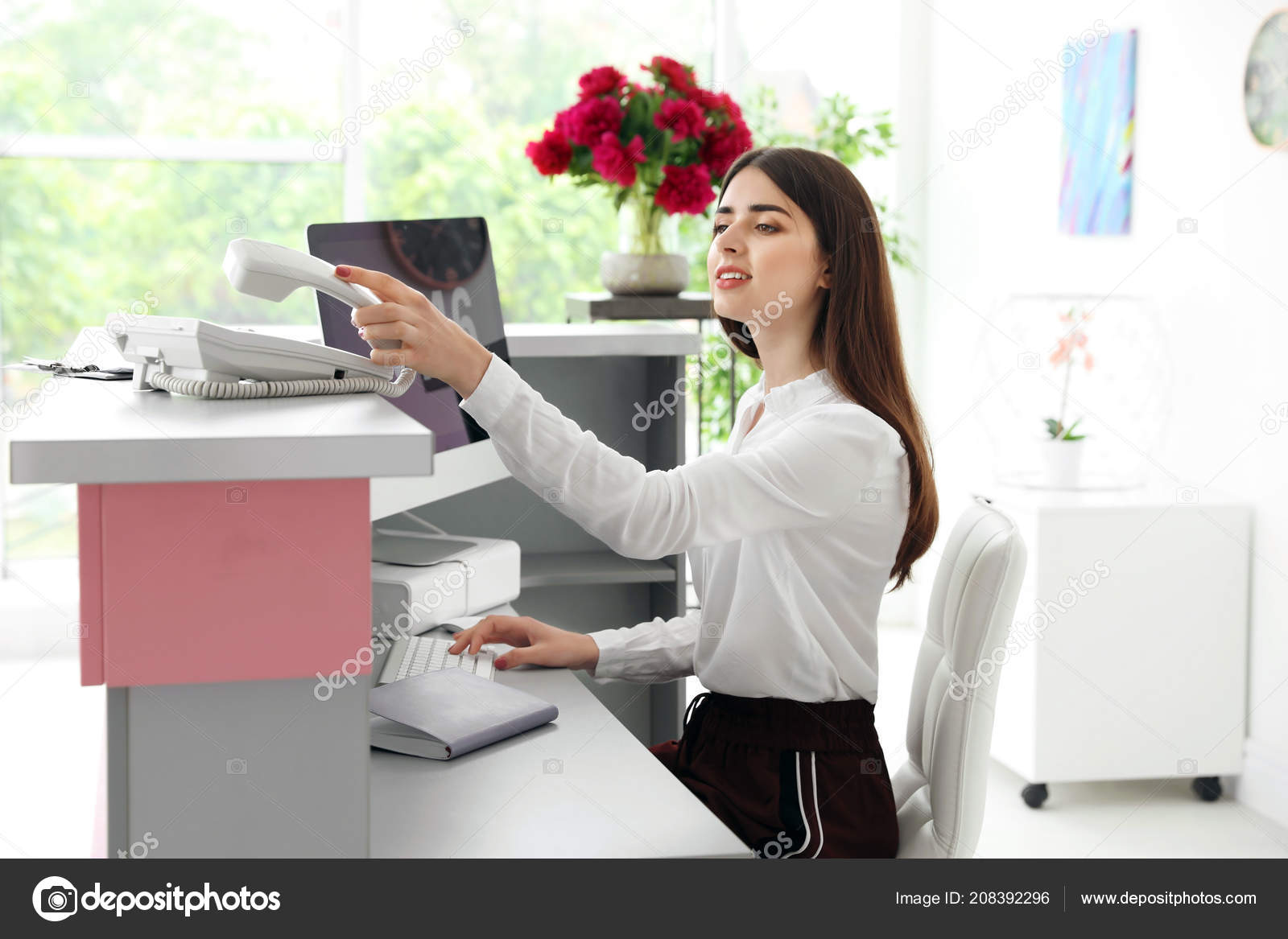 Beauty Salon Receptionist Using Computer Desk — Stock Photo © NewAfrica ...