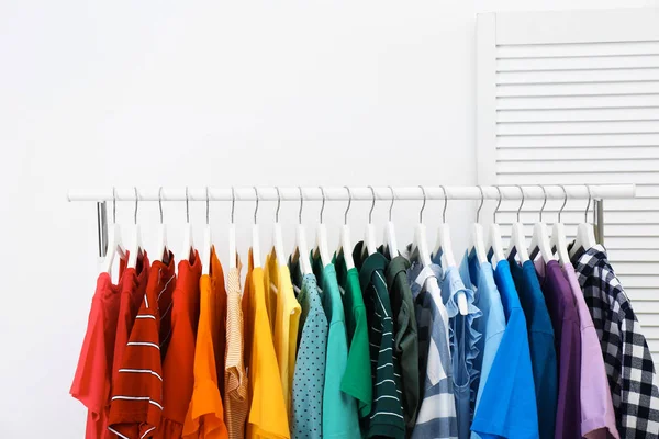 Rack Bright Clothes Color Background — Stock Photo © NewAfrica #225919058