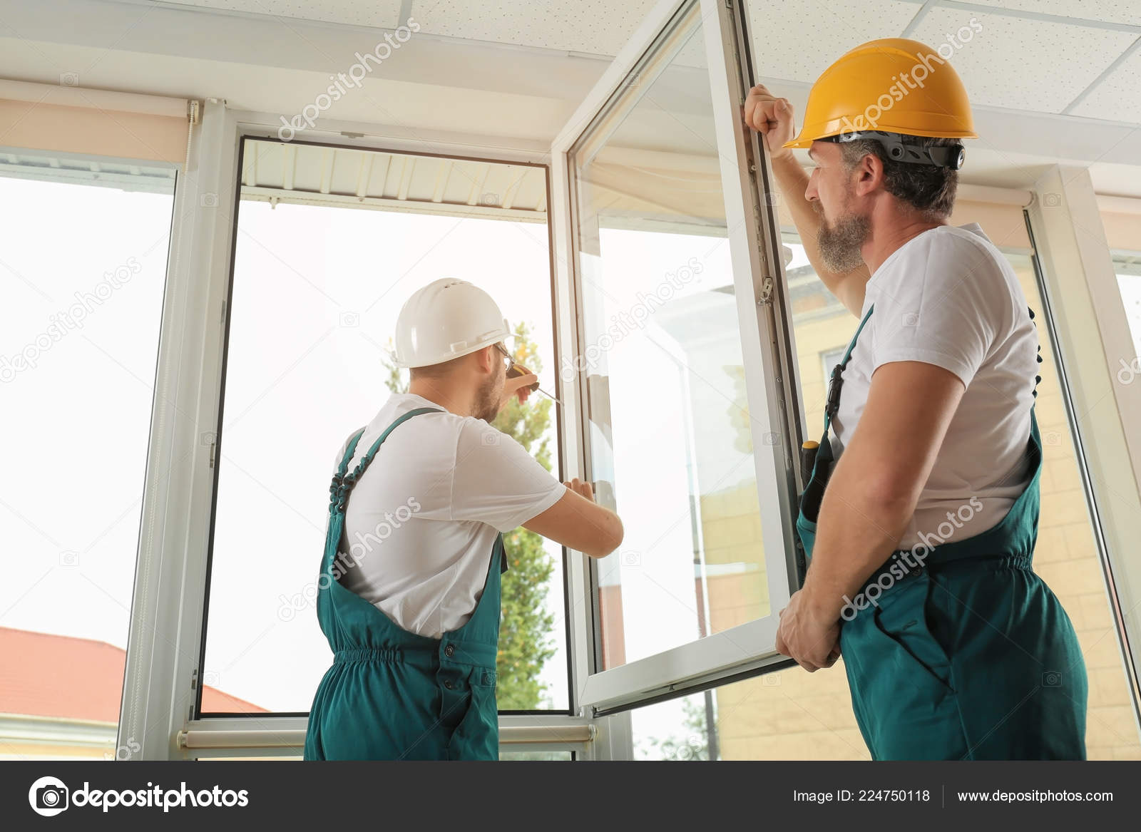 Construction Workers Installing New Window House Stock Photo by ...
