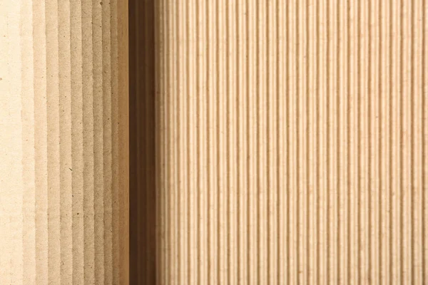 Corrugated cardboard as background, top view with space for text ...