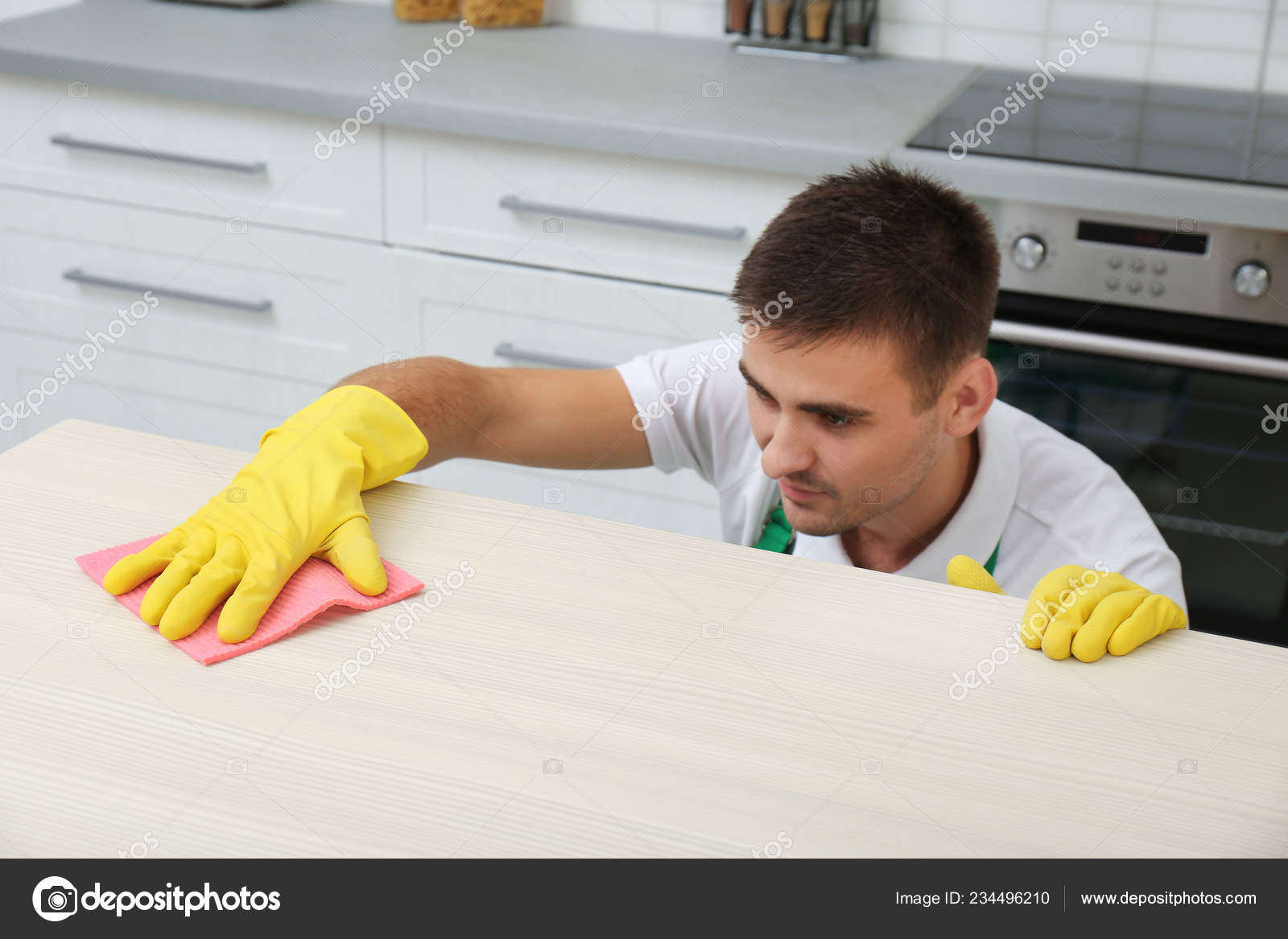 Man Cleaning Table Rag Kitchen — Stock Photo © NewAfrica #234496210