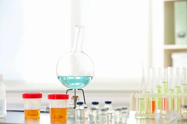 Scientist measuring acidity and pH of soil at table, closeup ...