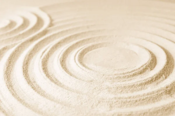 Zen garden pattern on sand. Meditation and harmony - Stock Image ...