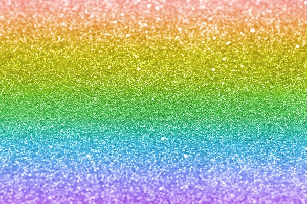 Composition of sparkling rainbow glitter as background - Stock Image ...