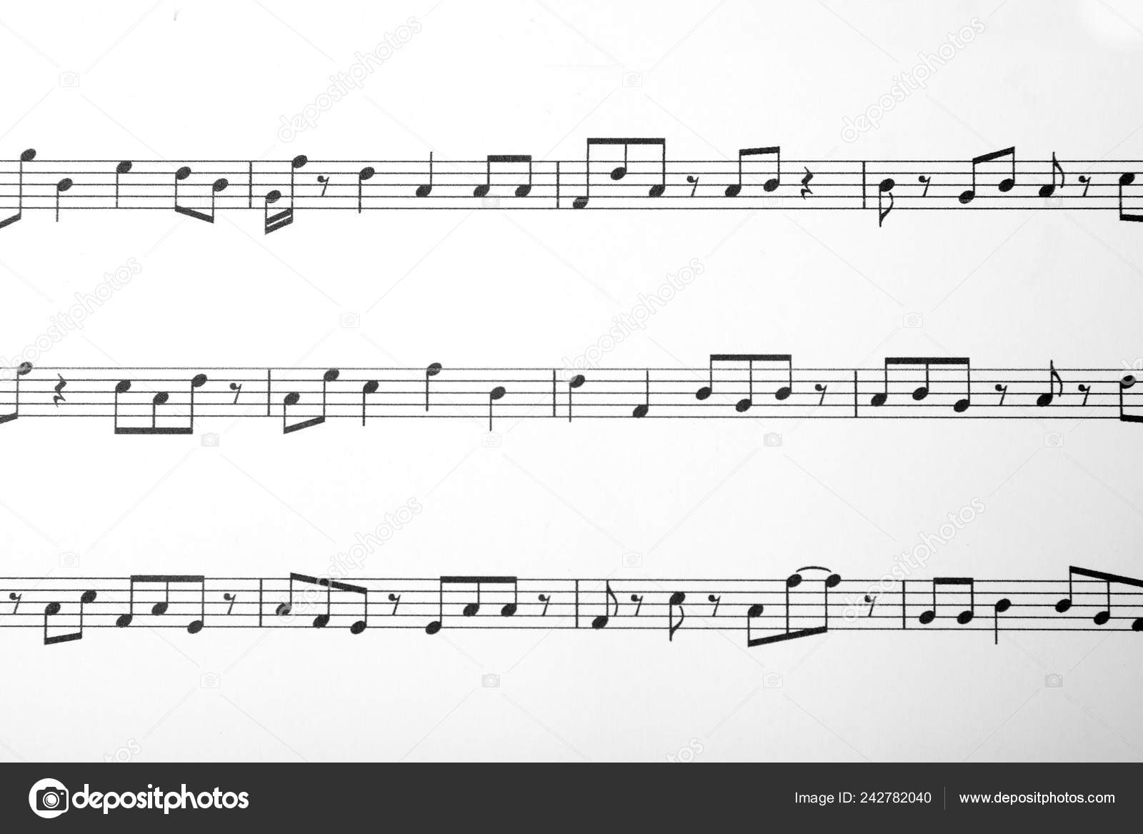 Sheet Music Notes Background Top View Stock Photo by ©NewAfrica 242782040