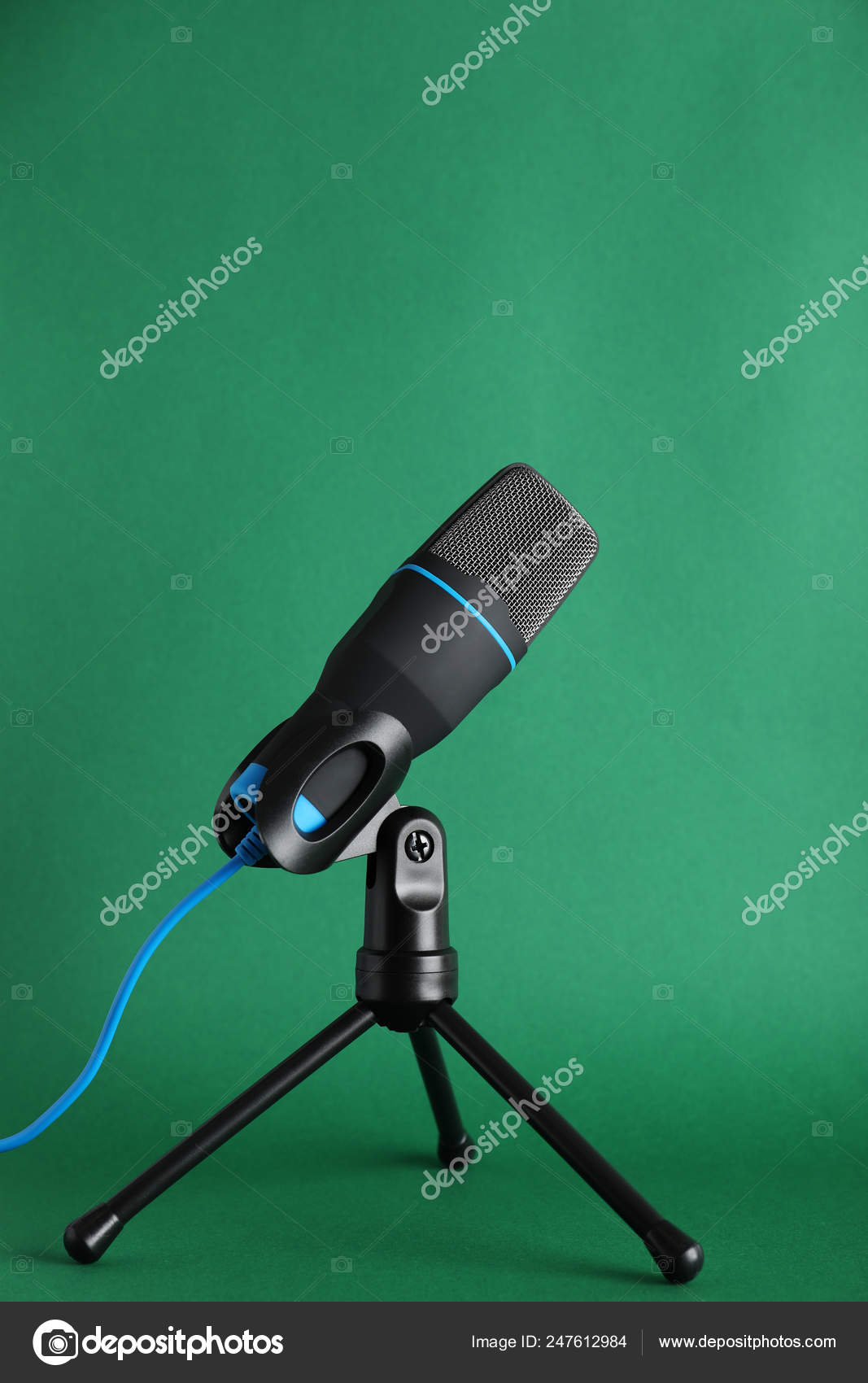 Condenser microphone on color background. Professional audio equipment ...