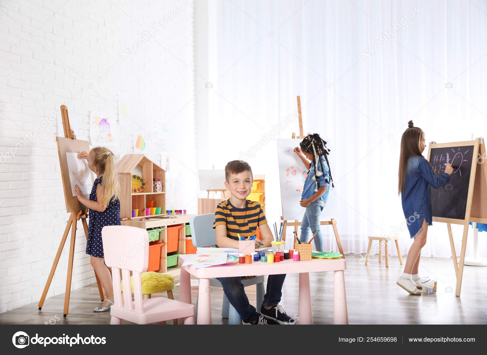 Cute little children drawing at painting lesson indoors — Stock Photo ...