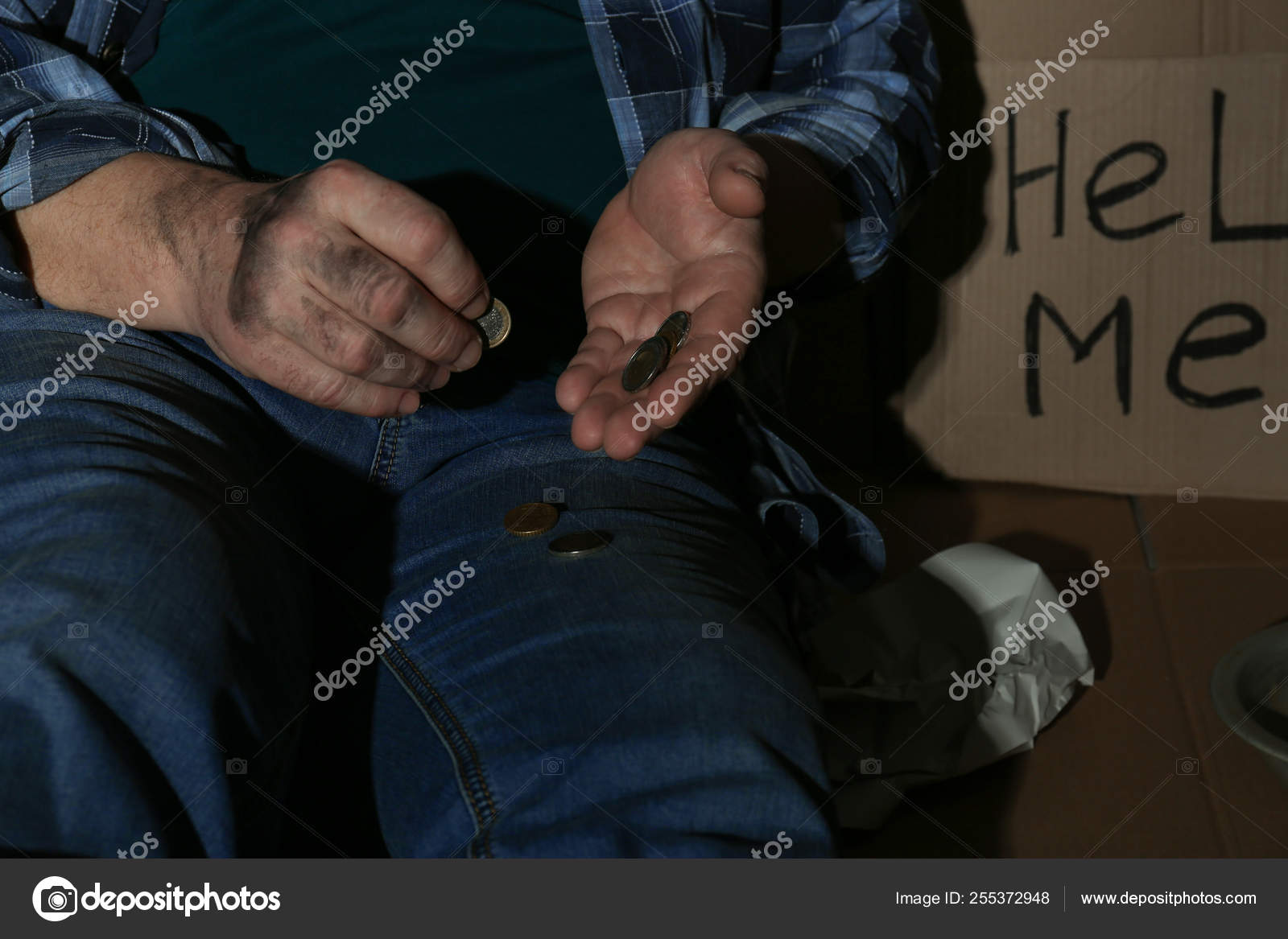 Poor senior man counting coins near cardboard sign HELP ME, closeup ...