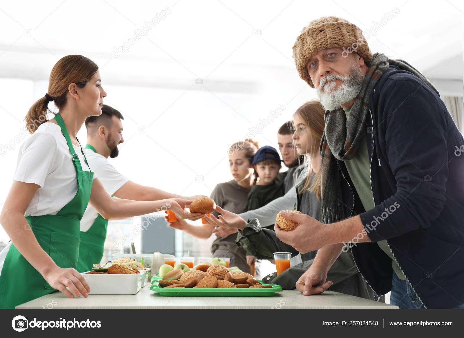 People Giving Food To Others